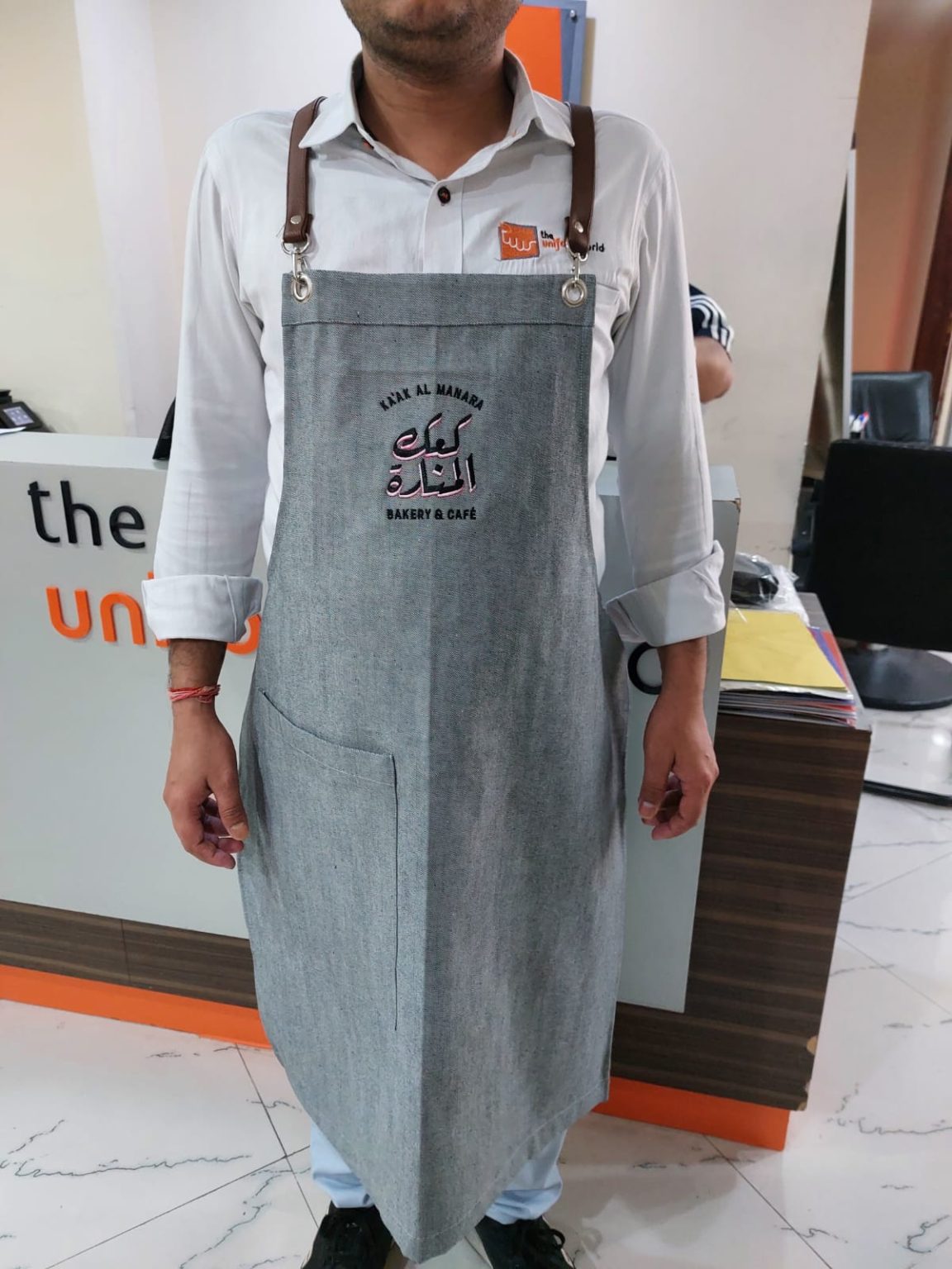 Grey Waist Bistro Apron with Brown Contrast Strap Tailoring Supplier in ...